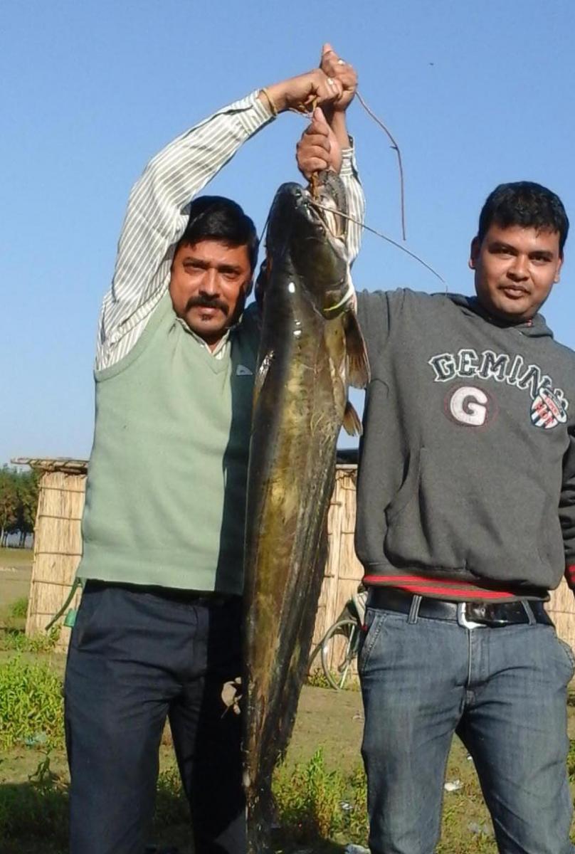 Fishing before feasting | Assam Times
